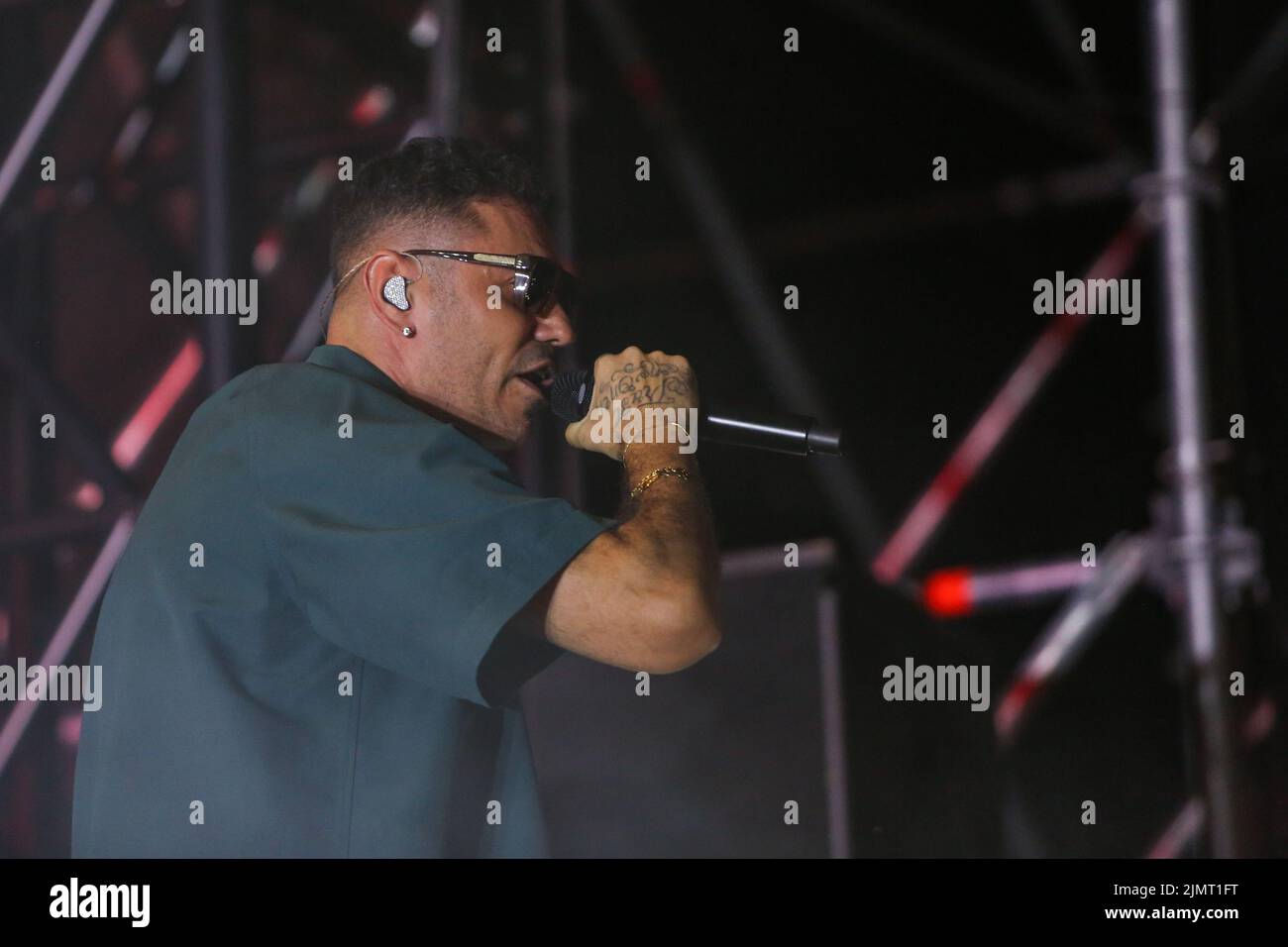 Italian rapper Marracash (Fabio Bartolo Rizzo) in concert on the stage ...
