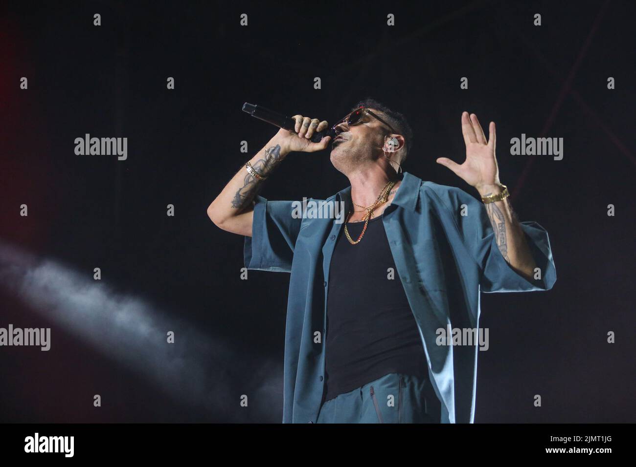 Italian rapper Marracash (Fabio Bartolo Rizzo) in concert on the stage ...