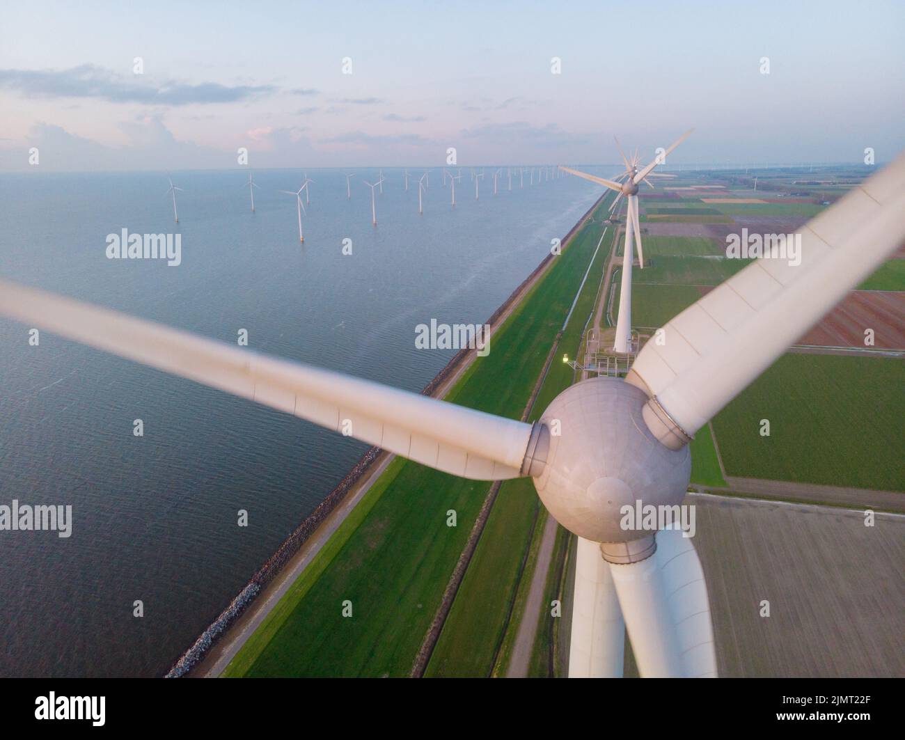 Windmill park in the ocean, drone aerial view of windmill turbines ...