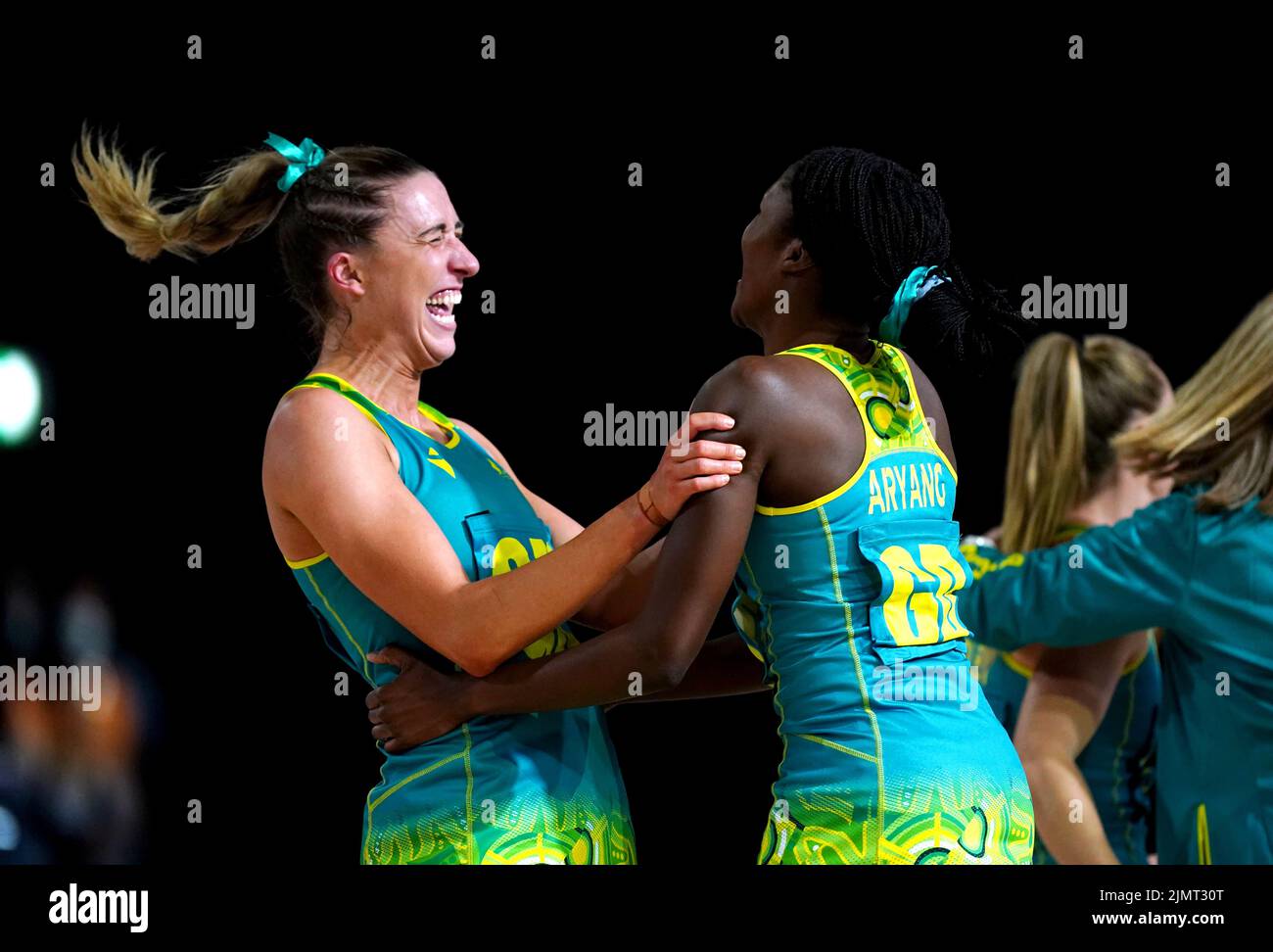 Australia's Sarah Klau (left) and Sunday Aryang celebrate after winning ...
