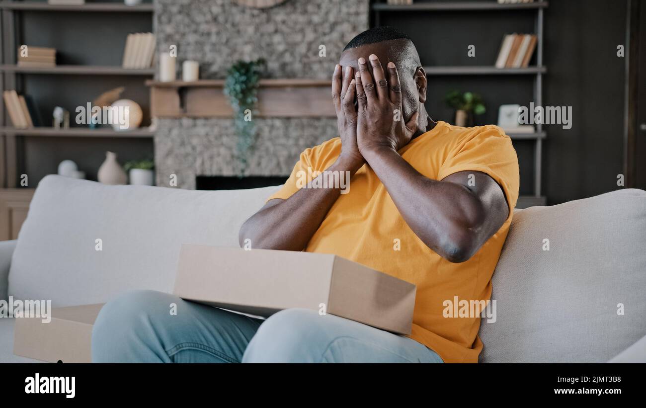 African man unpacking store hi-res stock photography and images - Alamy