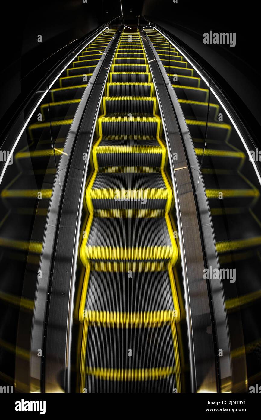 Yellow and black of the escalator Stock Photo - Alamy