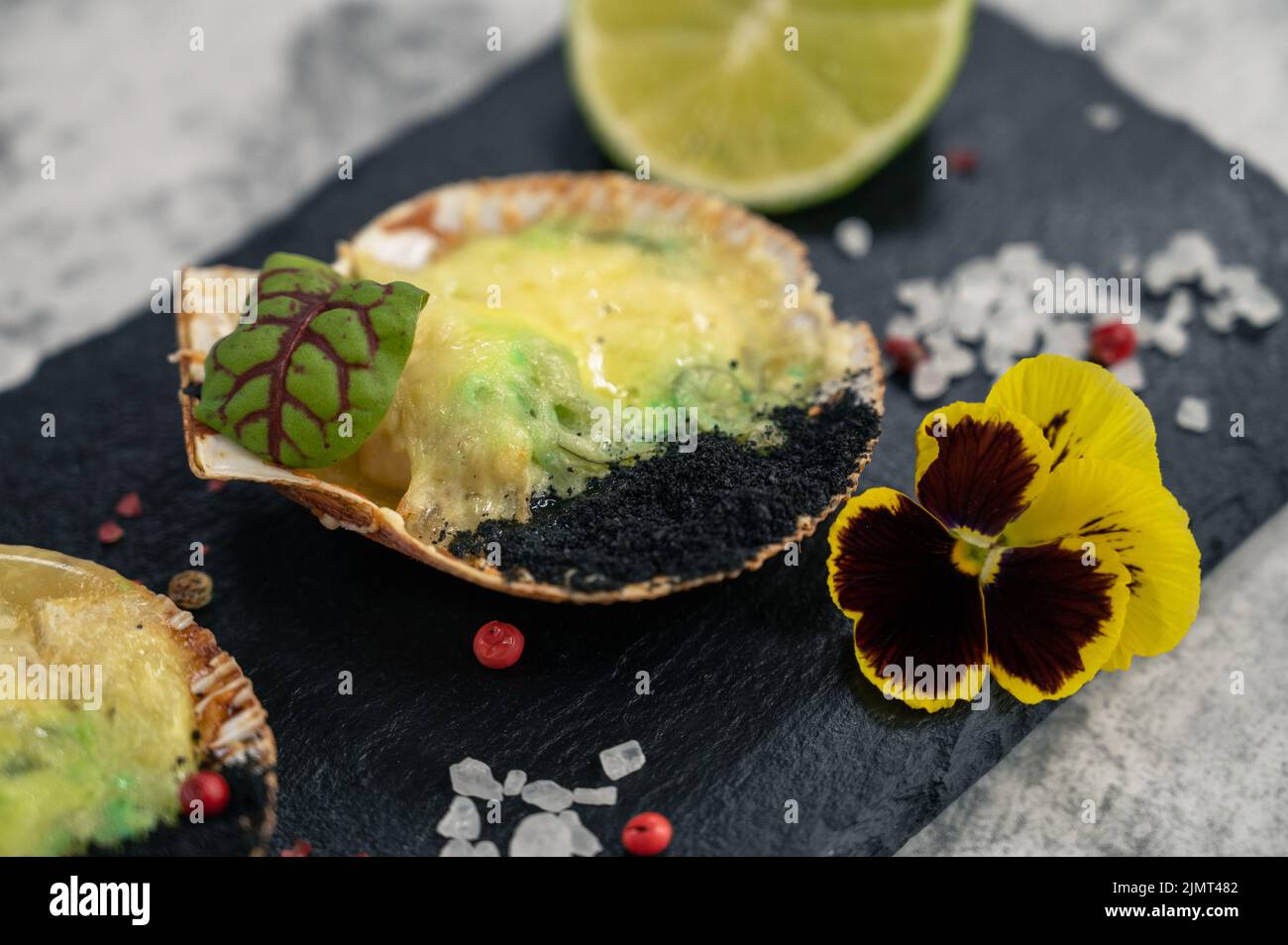 Delicacy roasted scallops cheese hi-res stock photography and images ...