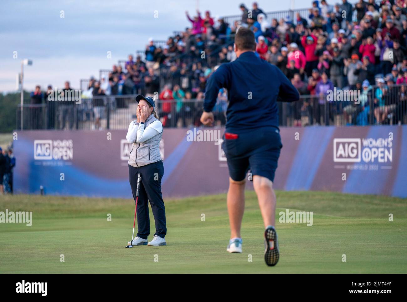 South Africa’s Ashleigh Buhai reacts as her husband David Buhai runs ...