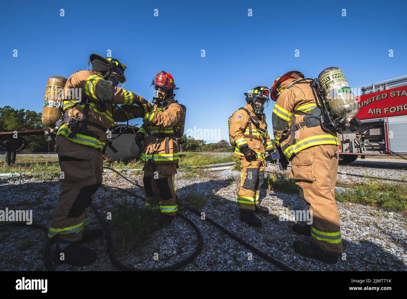 Firefighters assigned to the 6th Civil Engineer Squadron prepare for an ...