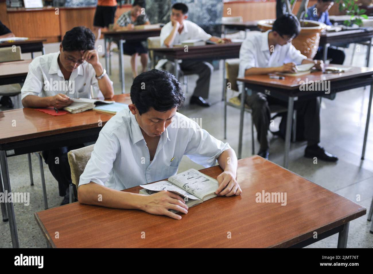08.08.2012, Pyongyang, North Korea, Asia - Students sit inside the ...