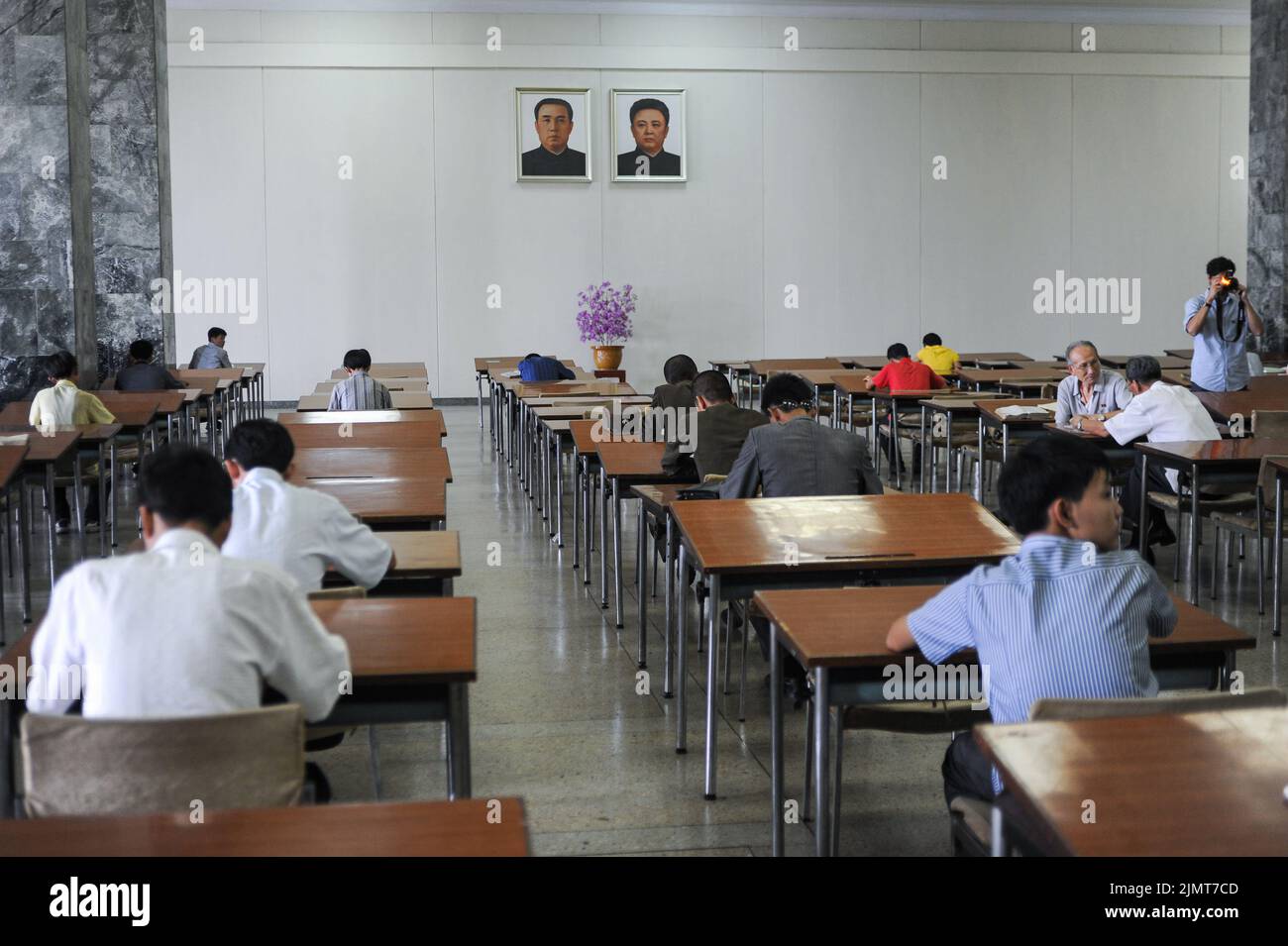 08.08.2012, Pyongyang, North Korea, Asia - Students sit inside the ...