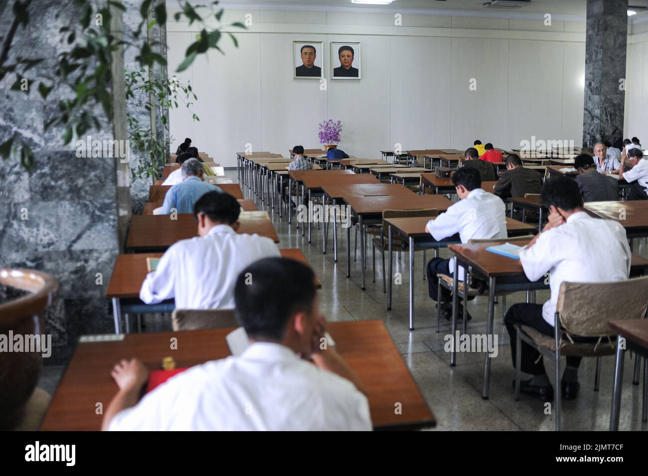08.08.2012, Pyongyang, North Korea, Asia - Students sit inside the ...