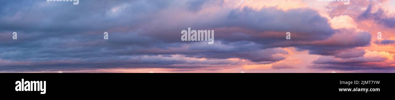 Clouds in evening dusk sky panoramic view. Climate, environment and ...