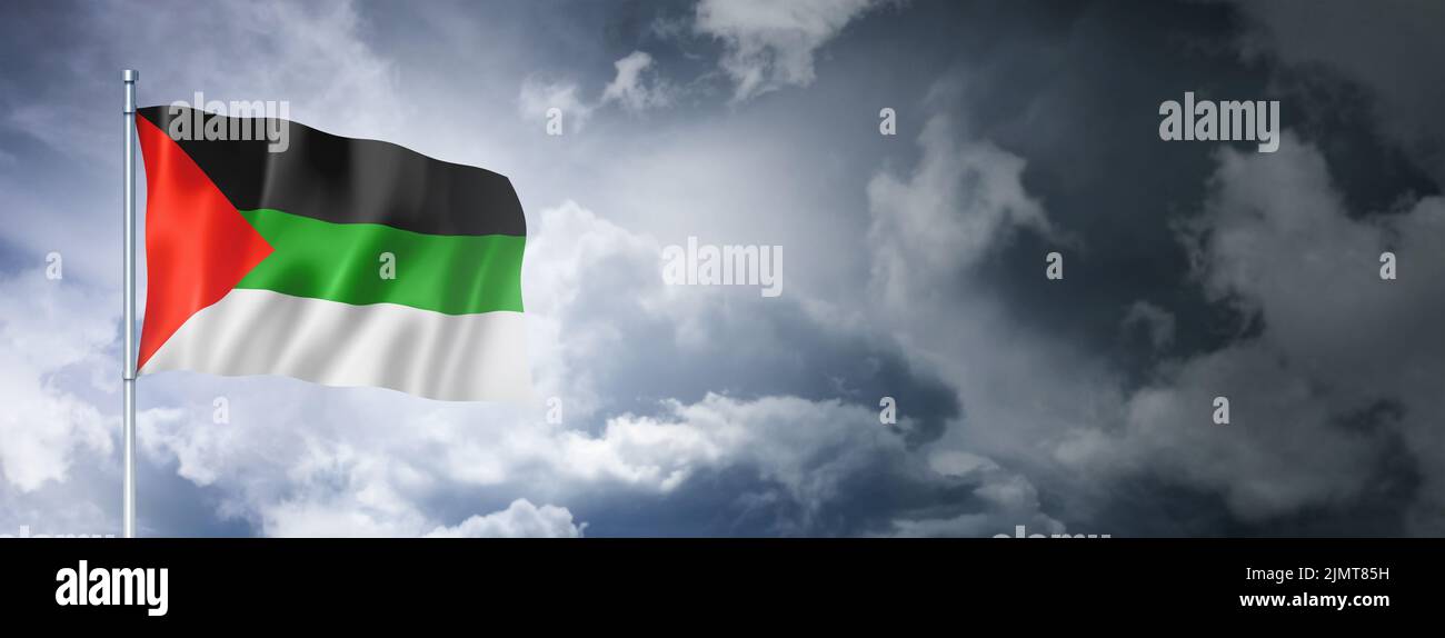 Arabic langage flag on a cloudy sky Stock Photo - Alamy