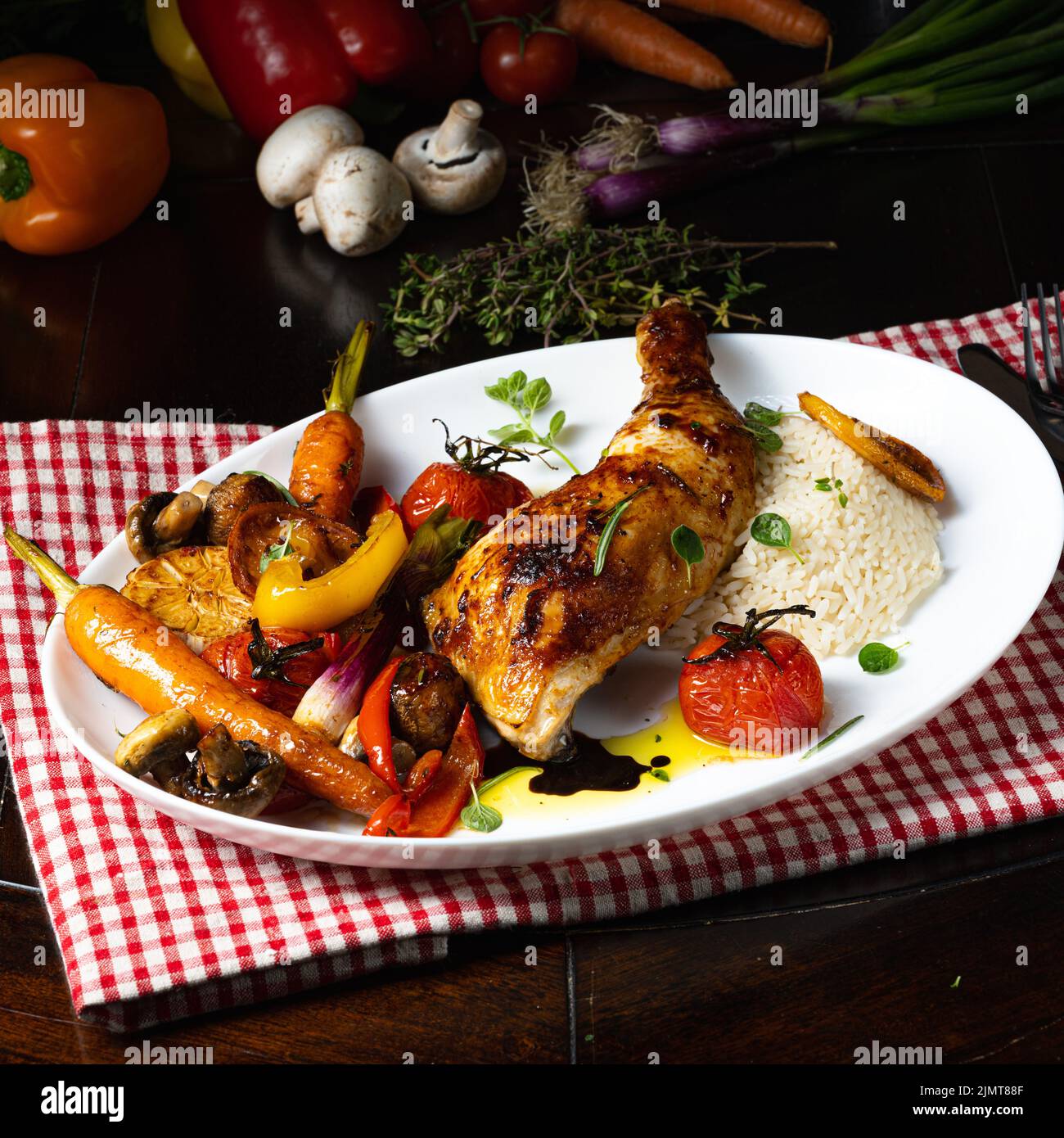 Rustic fried chicken legs with assorted vegetables and rice Stock Photo ...