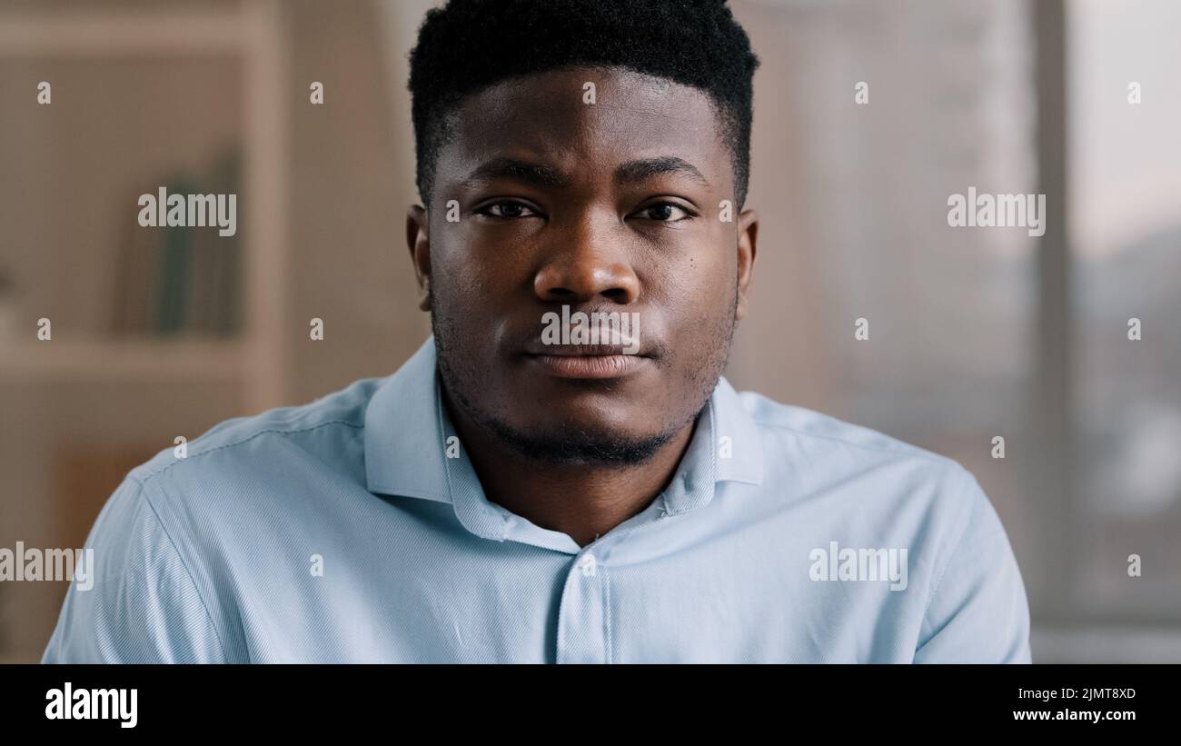 Portrait of concentrated african businessman brunet young guy with ...