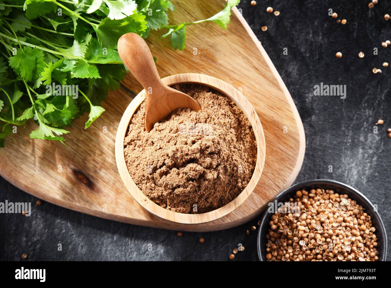 Composition with ground coriander Stock Photo - Alamy