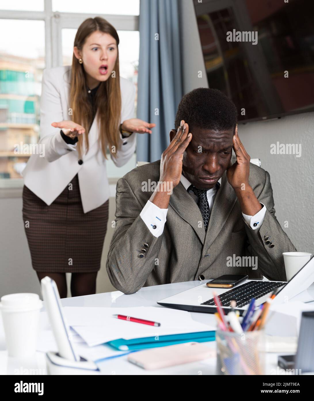 Serious unhappy international young hi-res stock photography and images ...