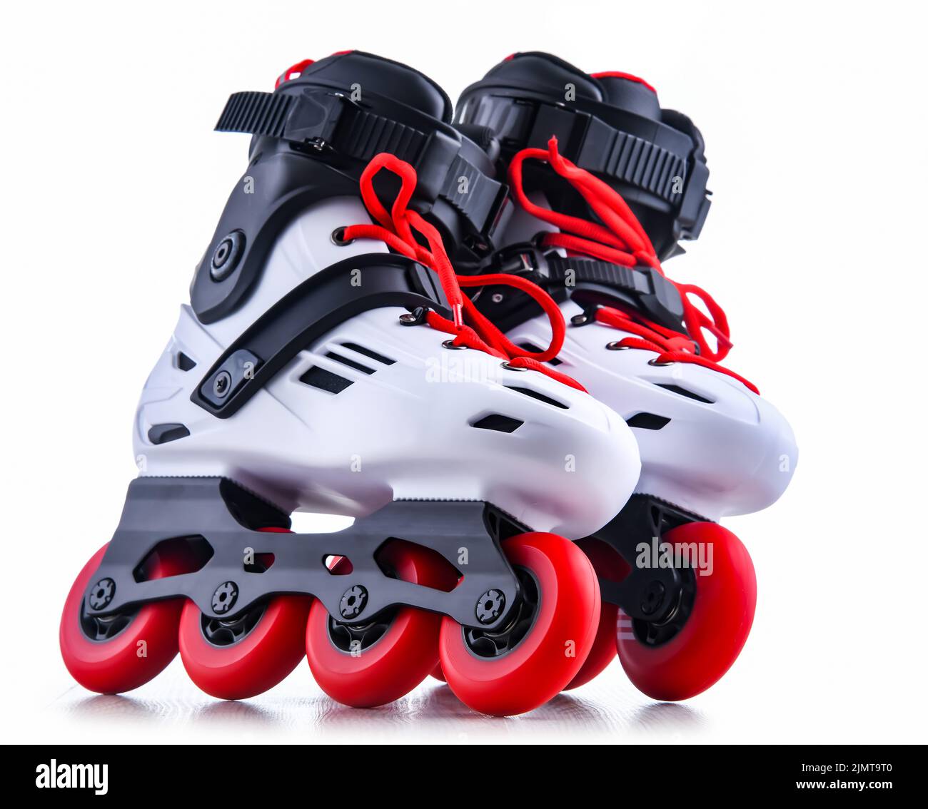 A pair of inline skates isolated on white background Stock Photo - Alamy