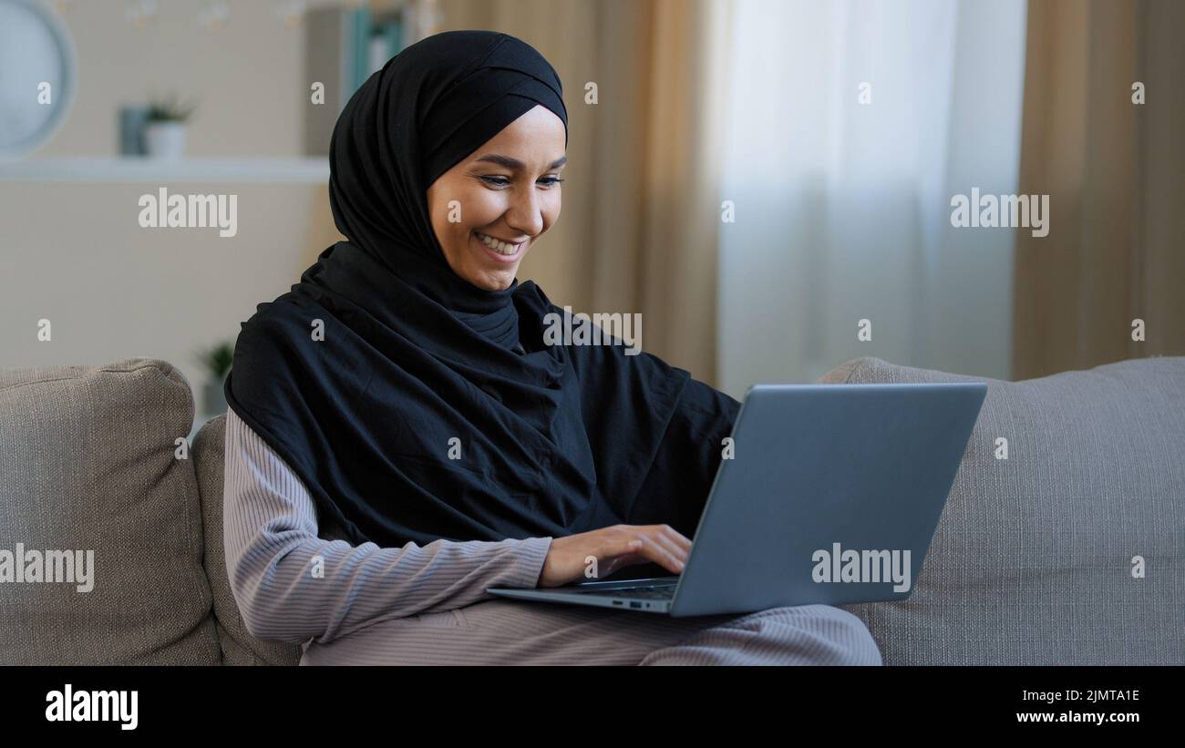 Happy arab woman muslim young girl woman freelancer creator in hijab ...