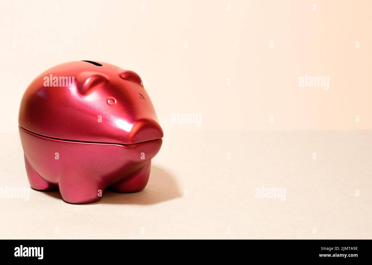 Front view of piggy bank isolated on white background Stock Photo - Alamy