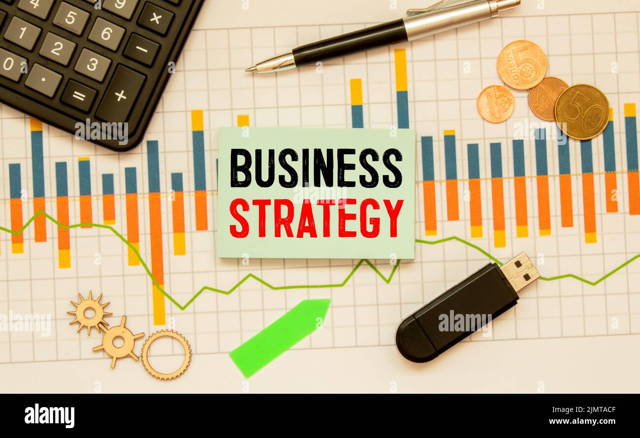 business or investment strategy concept with pen paper and coffee in ...