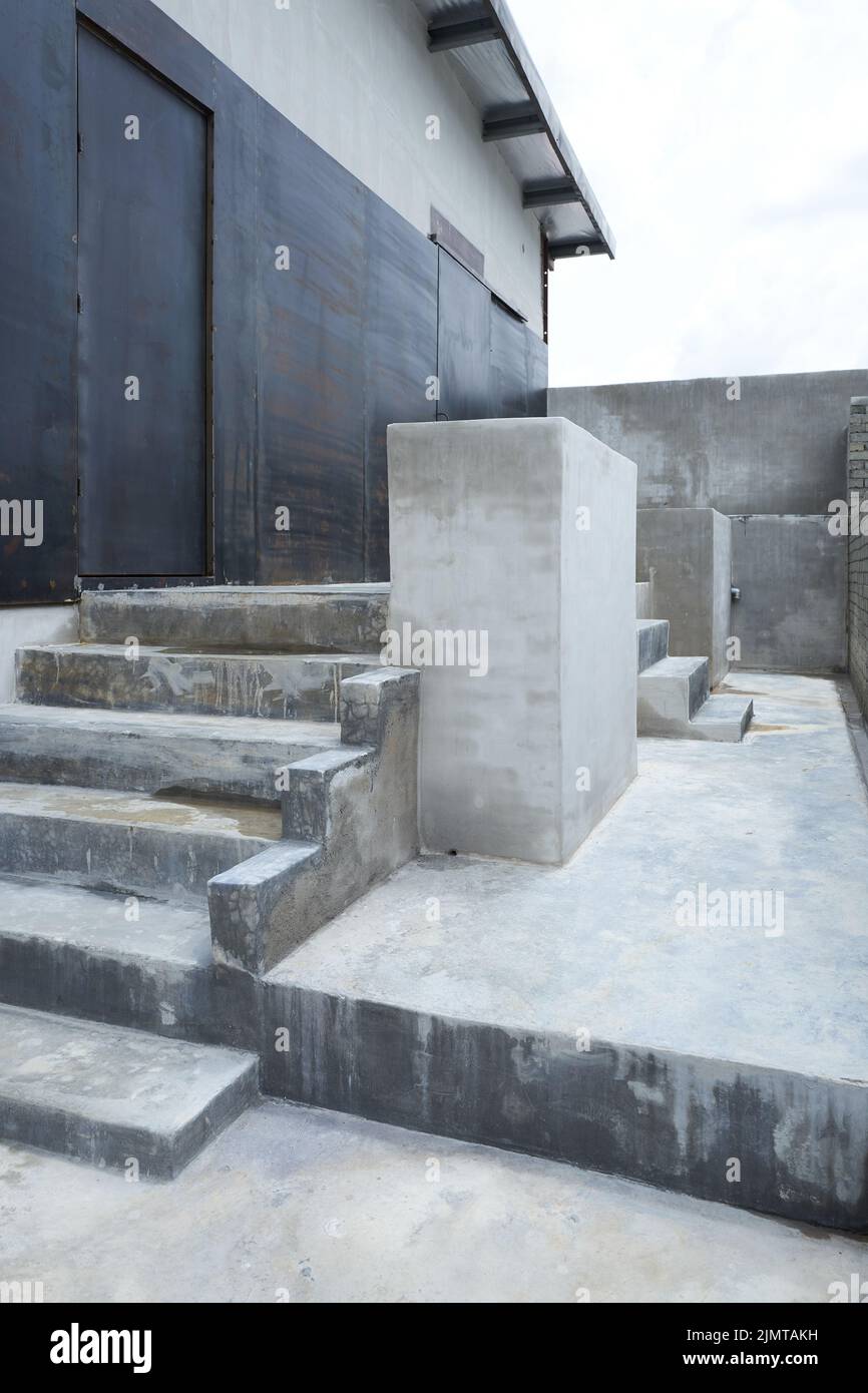 Rough concrete structure building exterior Stock Photo - Alamy