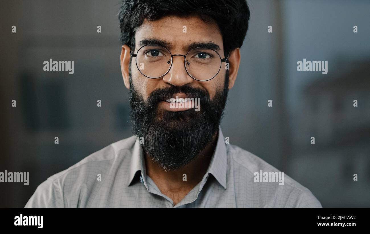 Young guy hispanic handsome bearded man smiling looking at camera male ...