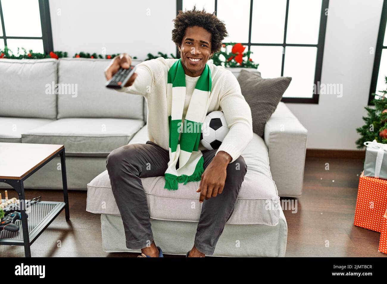 Young african american hooligan man smiling happy supporting soccer ...