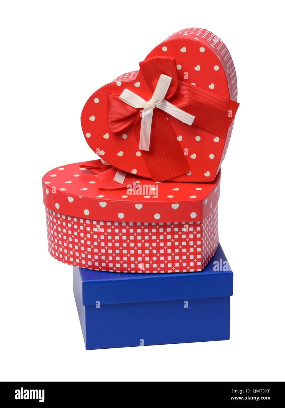 Stack of boxes wrapped in paper and tied with a silk ribbon on a white ...