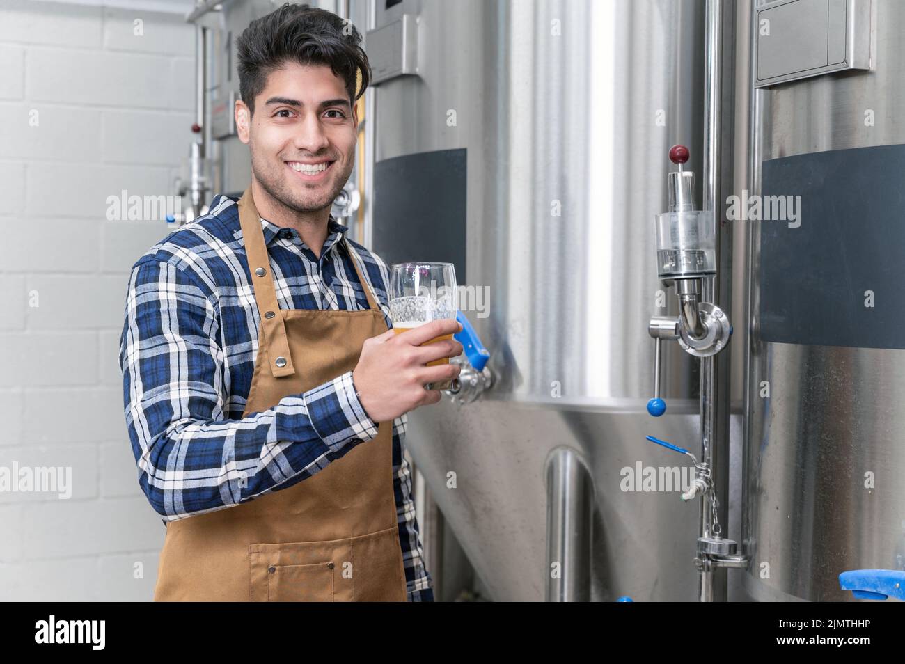 Brewery worker in work process hi-res stock photography and images - Alamy