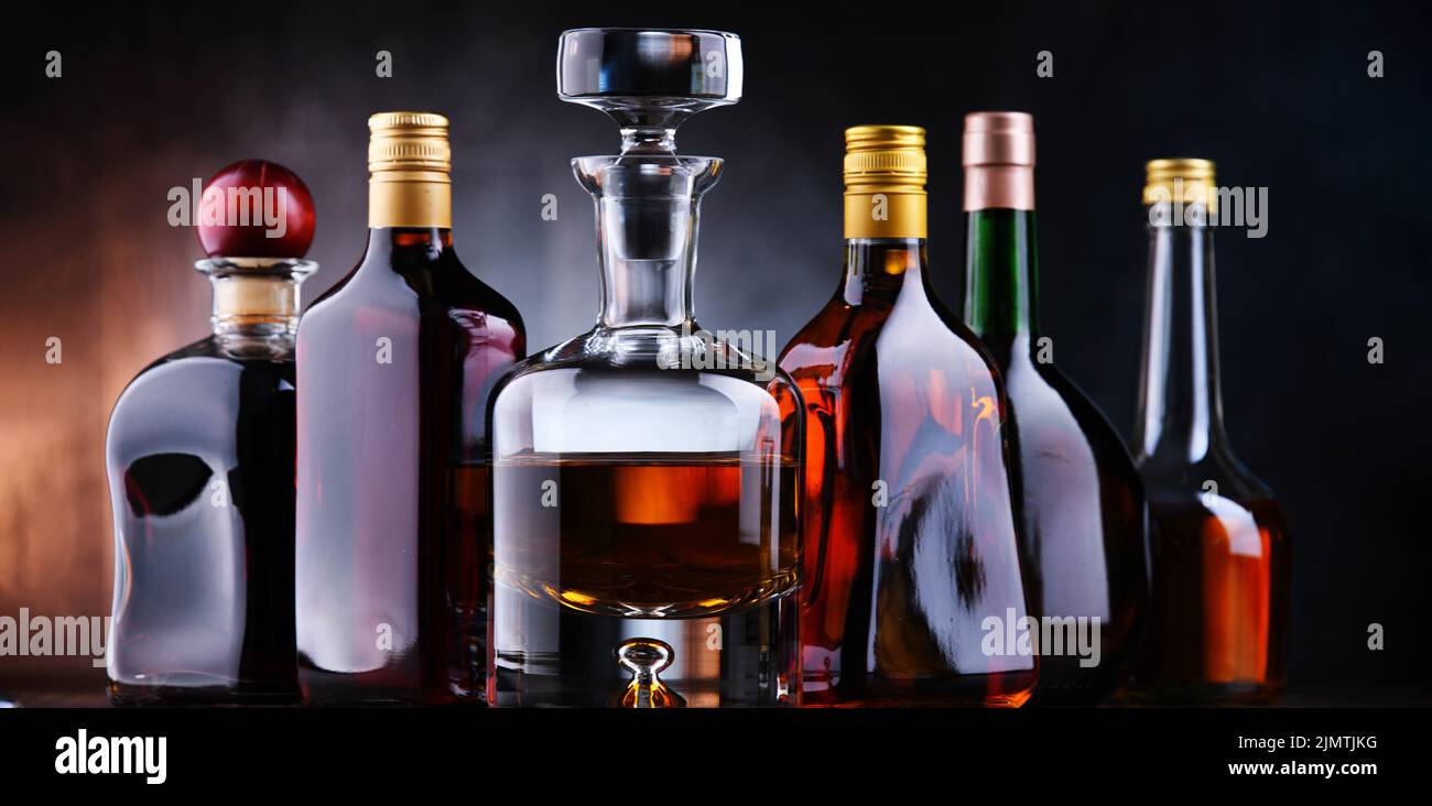 Bottles of assorted alcoholic beverages Stock Photo - Alamy