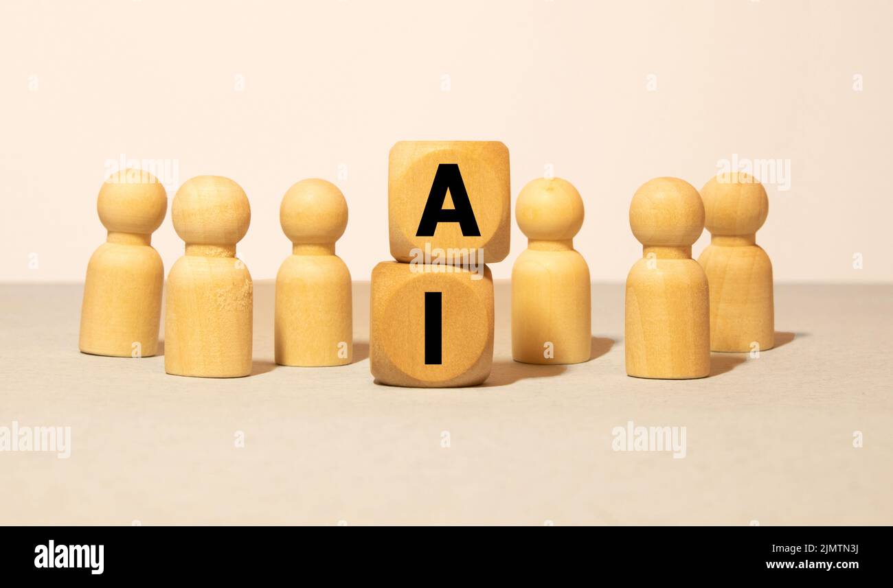 Artificial Intelligence word written on wood block. AI text on cement ...