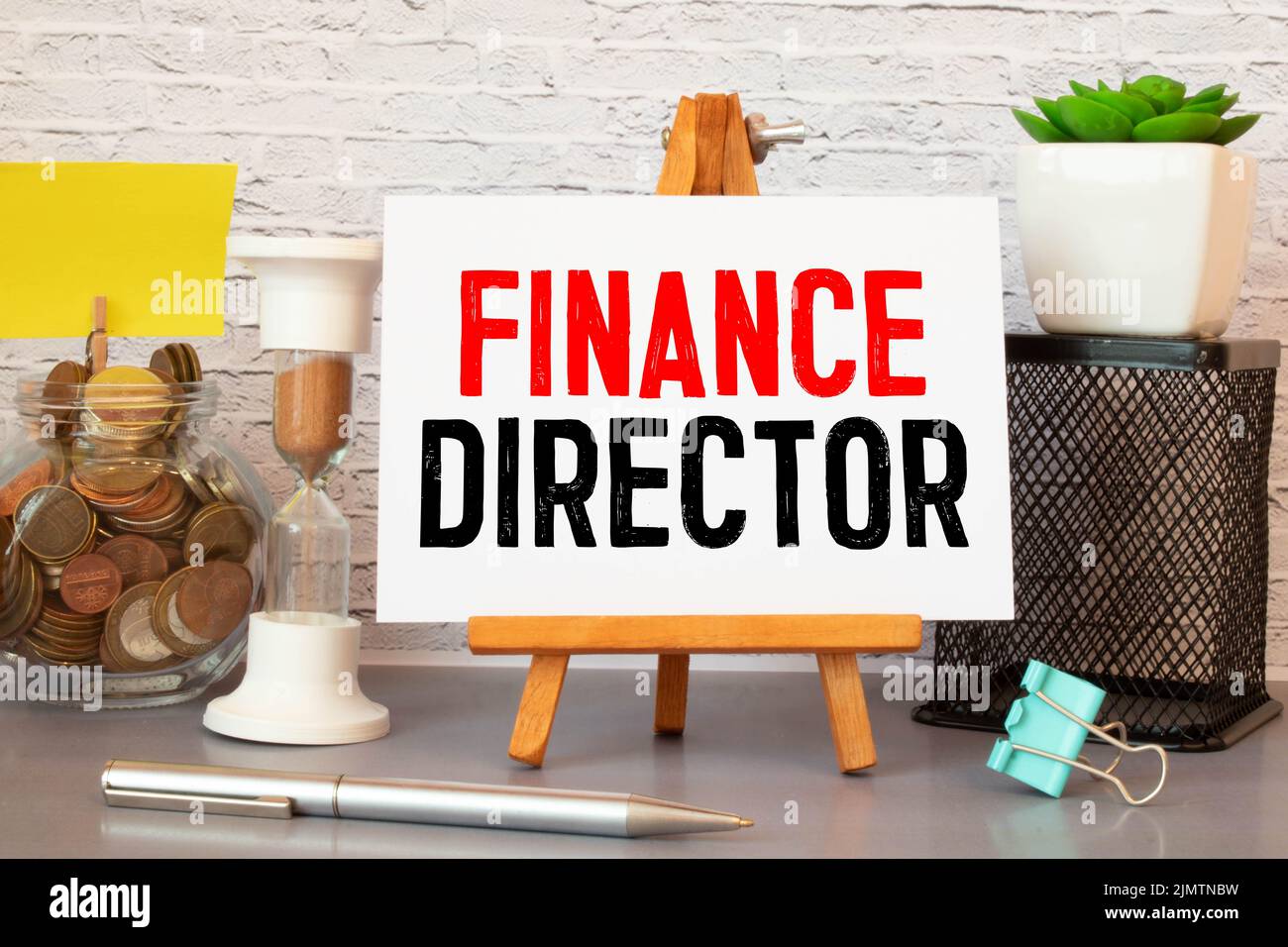 Closeup on card with text FINANCE DIRECTOR, business concept image with ...