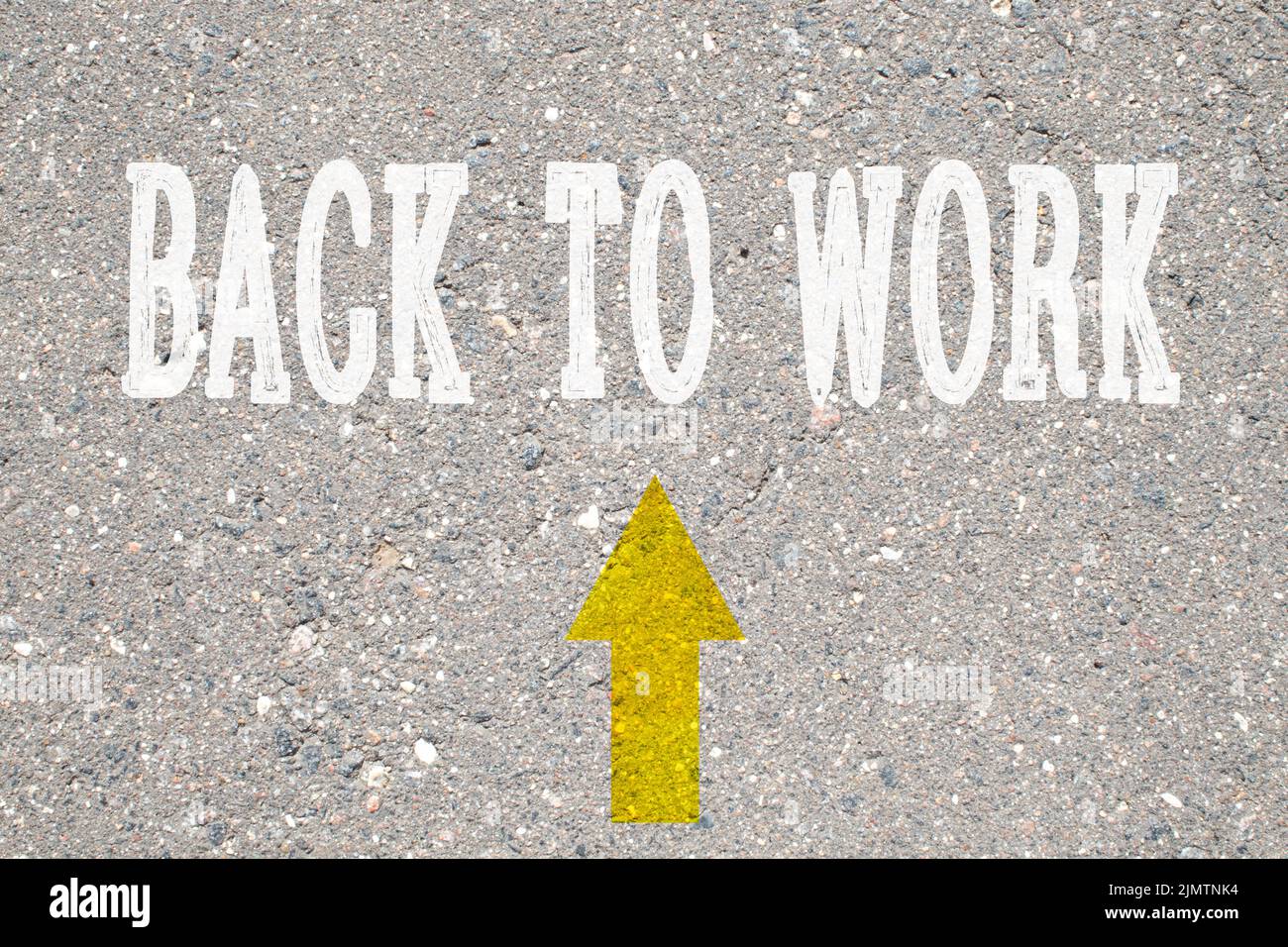Words back to work written with wooden blocks on black background and ...