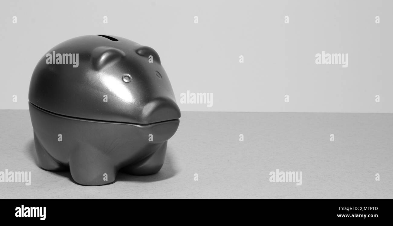 Piggy bank pink on Black and White Stock Photos & Images - Alamy