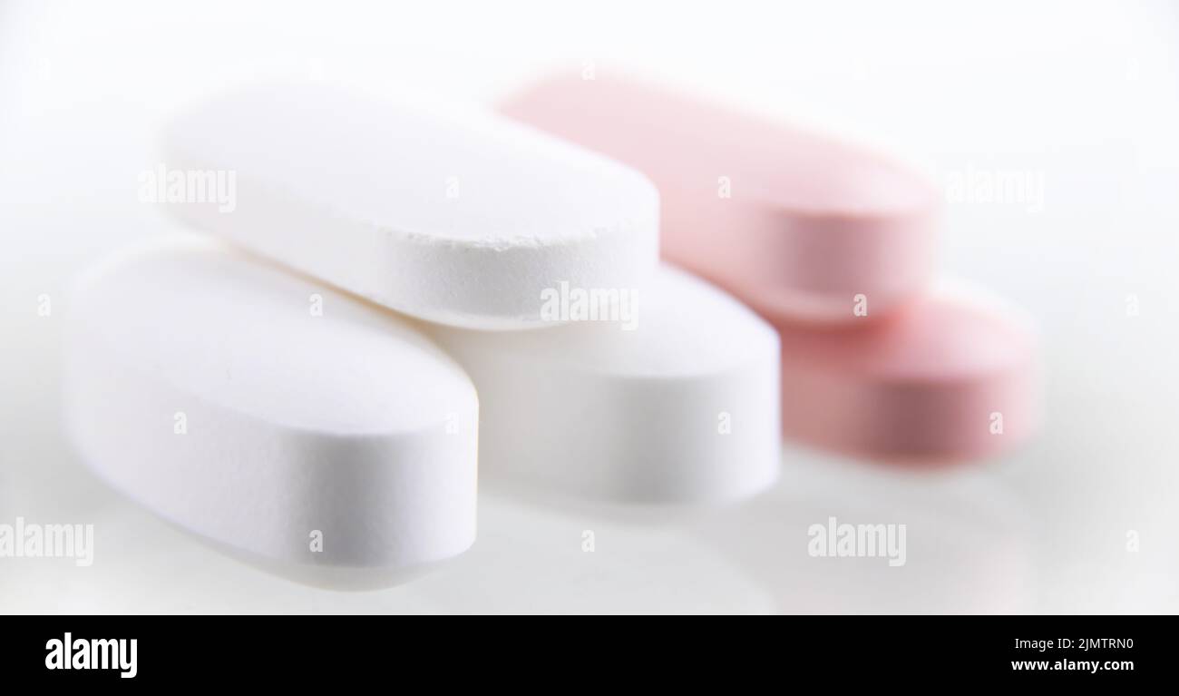 Composition with pharmaceutical drug pills over white background Stock ...