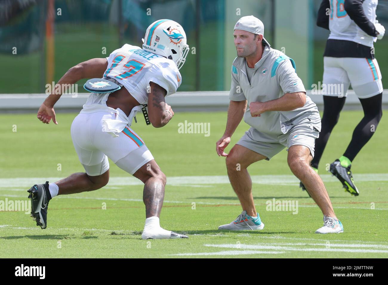 Miami. FL USA; Wide receivers coach Wes Welker runs drills with Jaylen ...