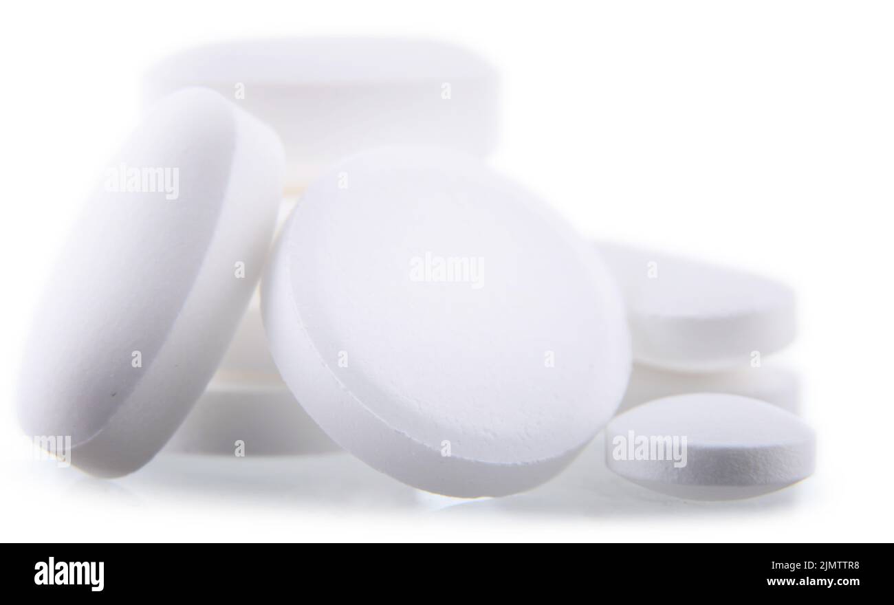 Composition with pharmaceutical drug pills over white background Stock ...