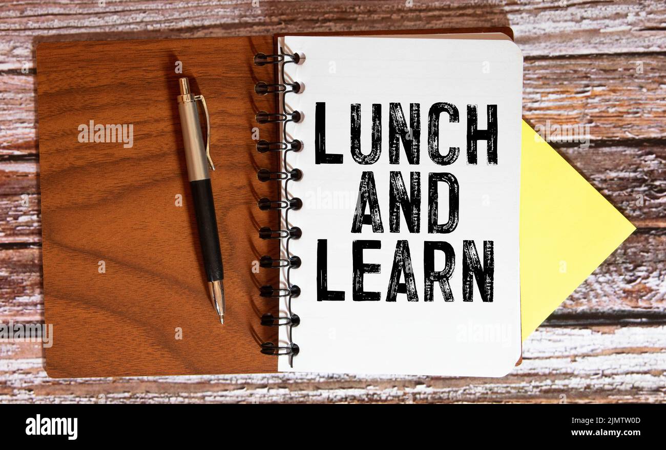Lunch and Learn, A spiral Notepad that has the words Lunch and Learn ...