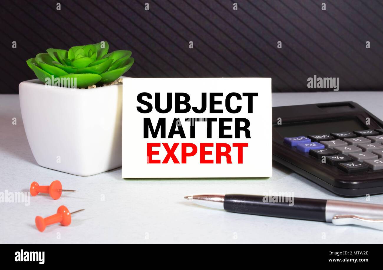 Handwritten text Subject Matter Expert with fountain pen on notebook ...