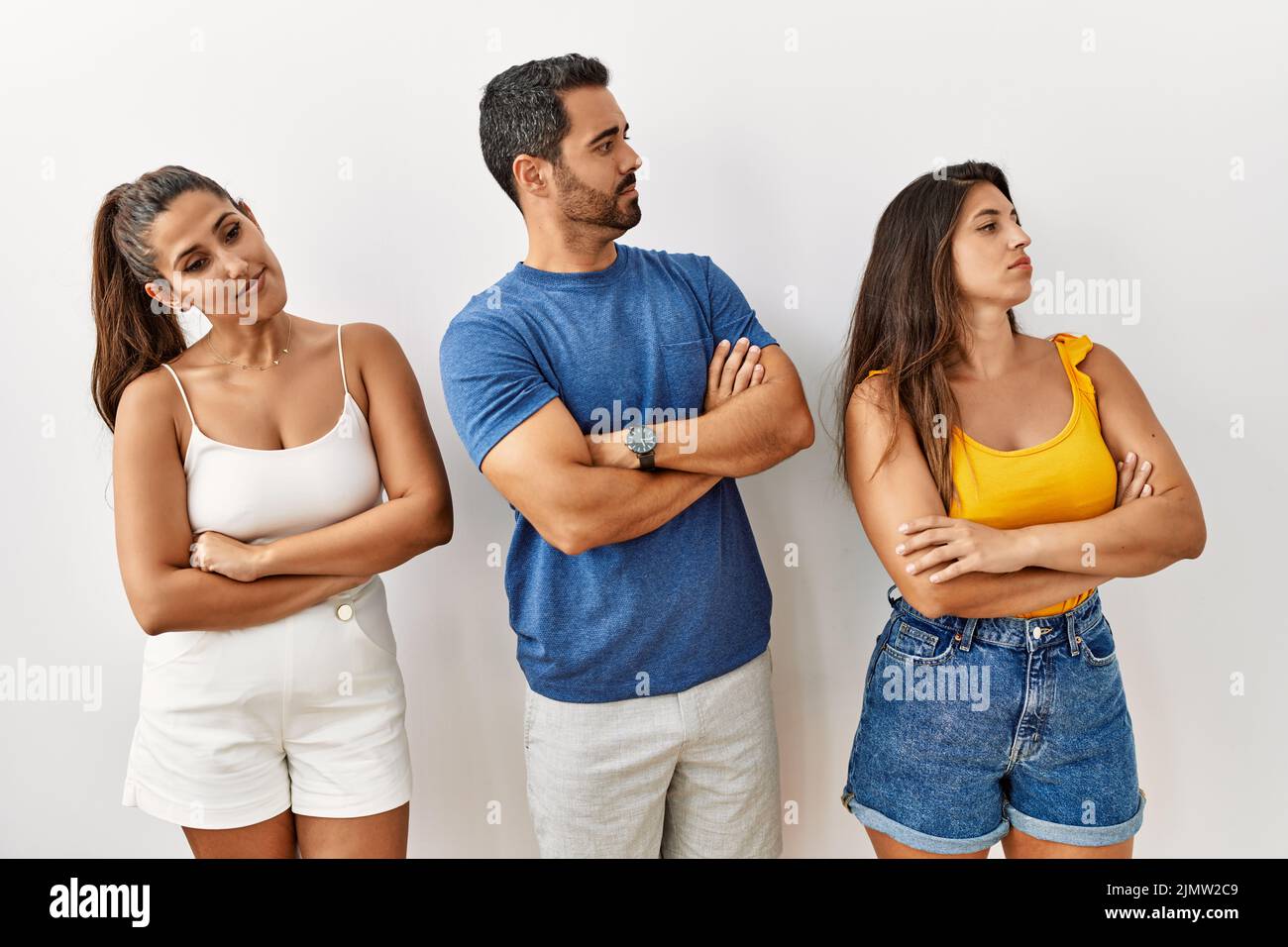 Group of young hispanic people standing over isolated background ...
