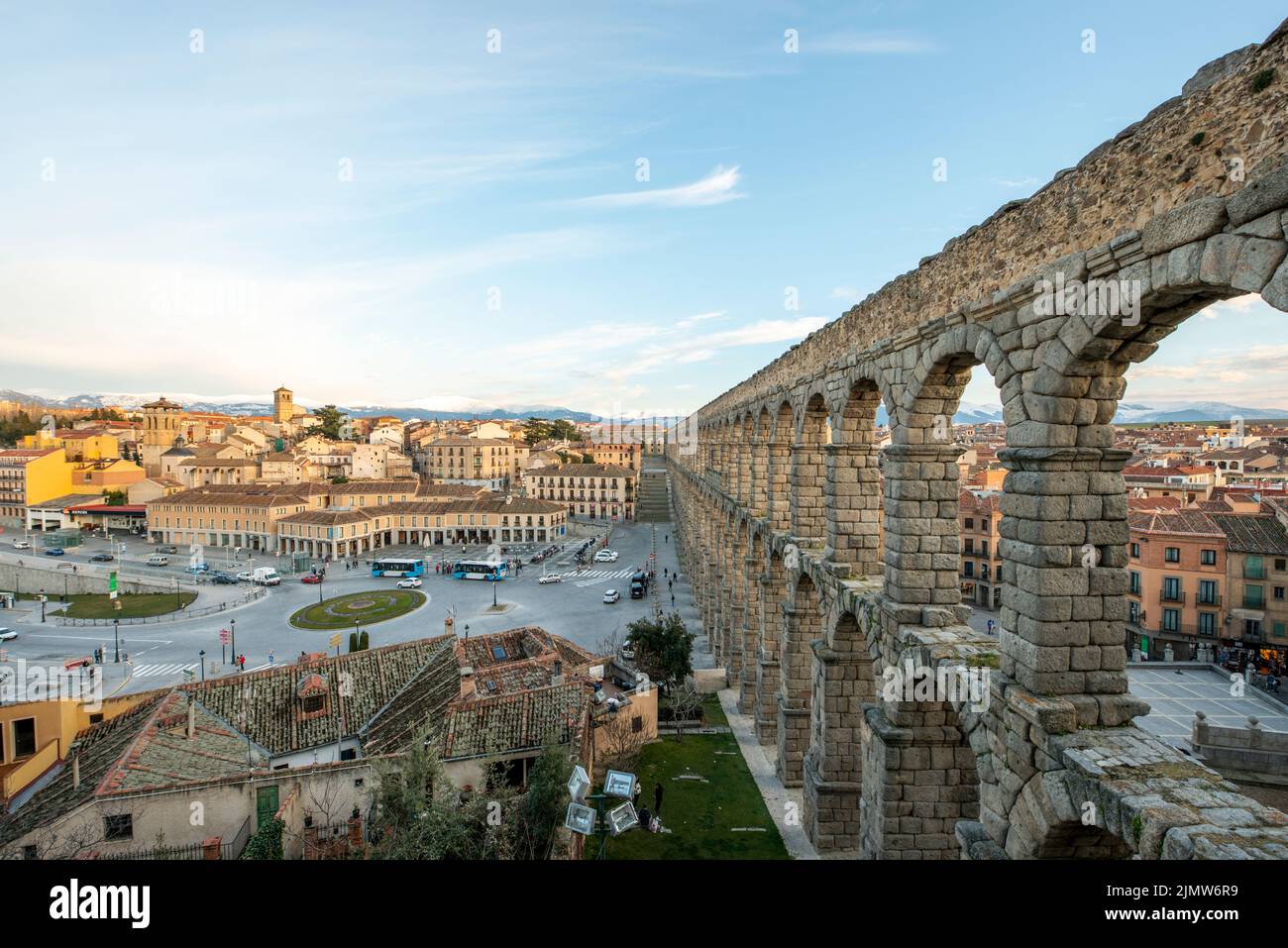 View of the city of Segovia with the Roman stone aqueduct to one side ...