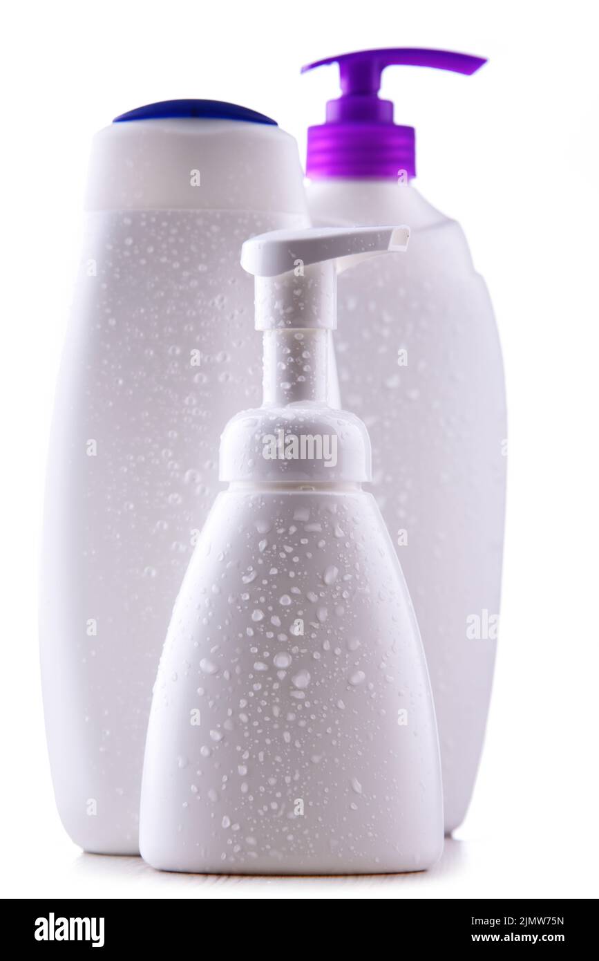 Plastic contaiers of shampoos and shower gels isolated on white ...