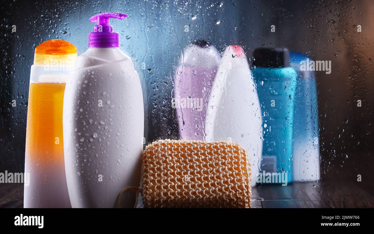 Different containers of body care products in the bathroom Stock Photo ...