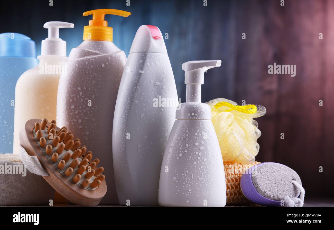 Plastic contaiers of shampoos and shower gels Stock Photo - Alamy