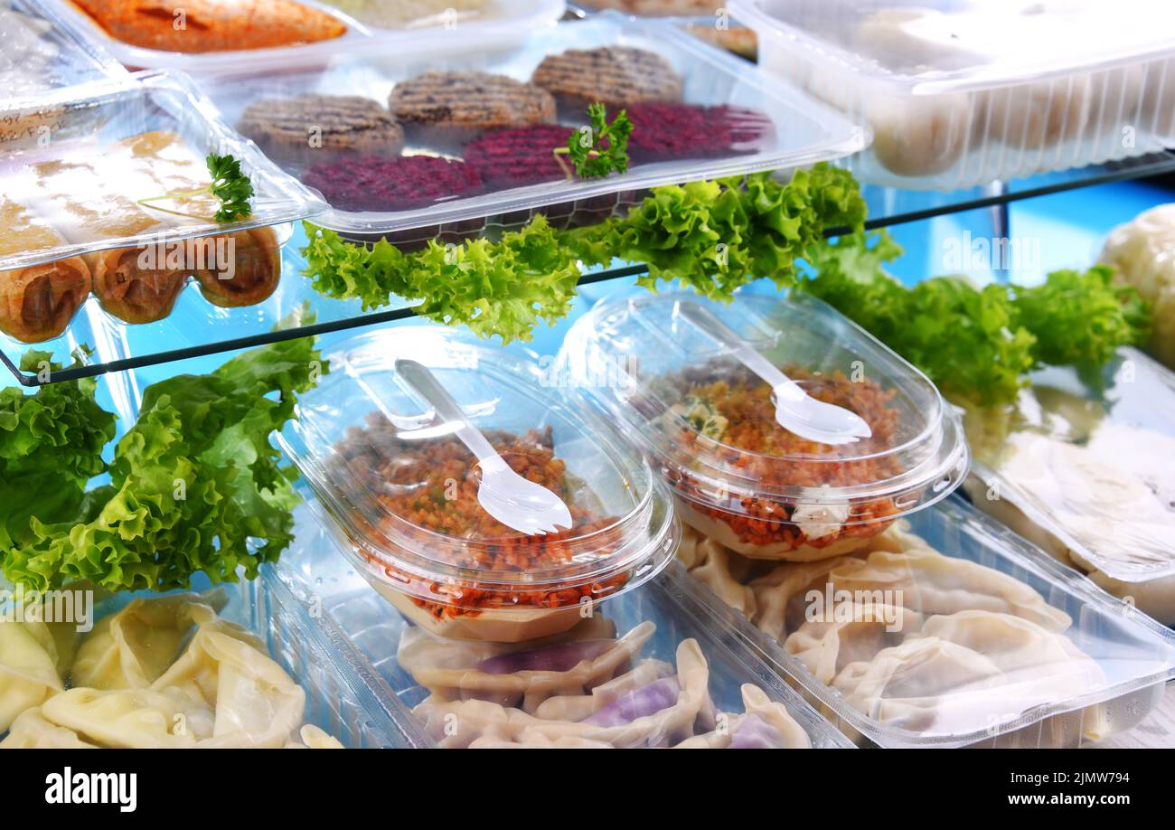 A variety of prepackaged food products in plastic boxes Stock Photo - Alamy