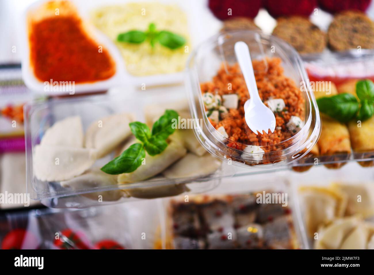 A variety of prepackaged food products in plastic boxes Stock Photo - Alamy