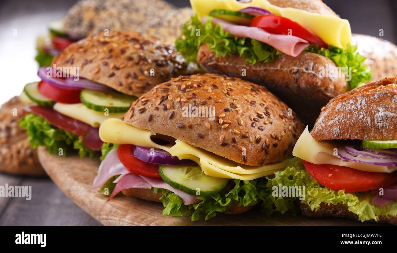 Ham and cheese sandwiches on the kitchen table Stock Photo - Alamy