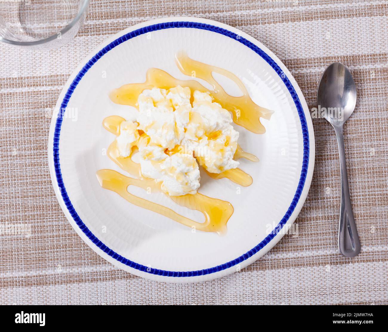 Catalan cheese mato from goat milk with honey Stock Photo - Alamy