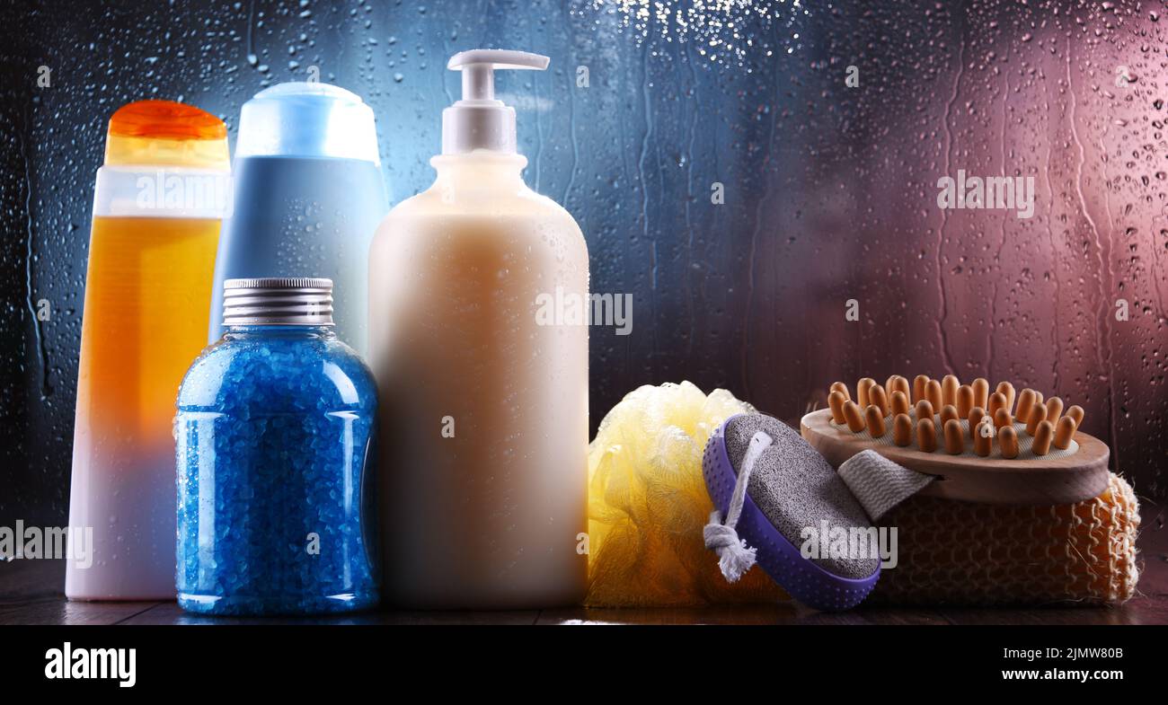 Different containers of body care products in the bathroom Stock Photo ...