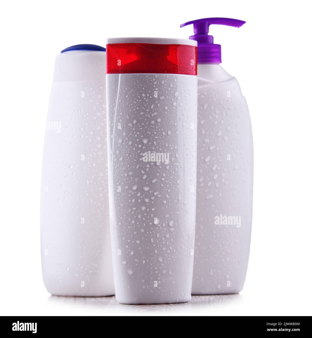 Plastic contaiers of shampoos and shower gels isolated on white ...