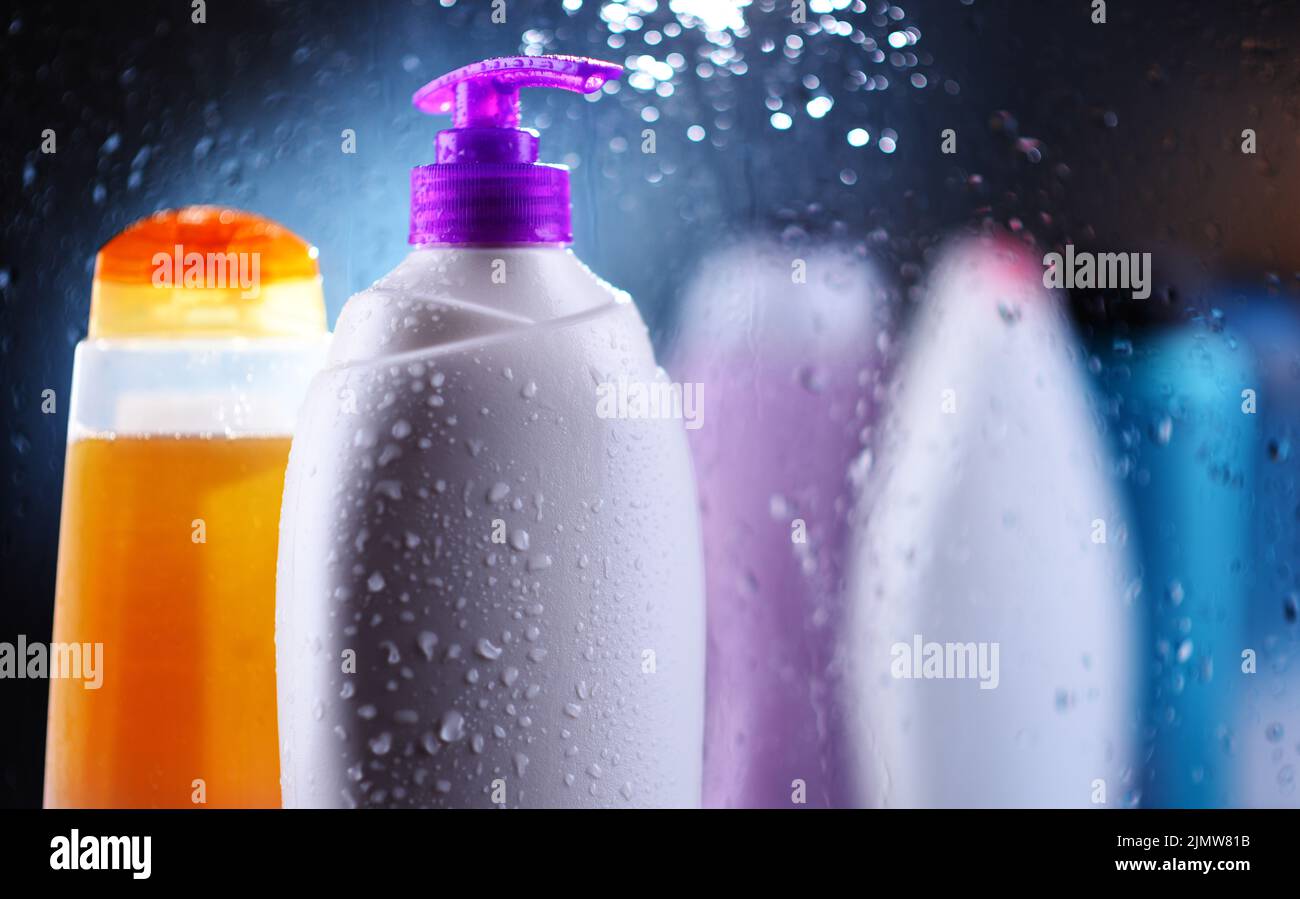 Different containers of body care products in the bathroom Stock Photo ...
