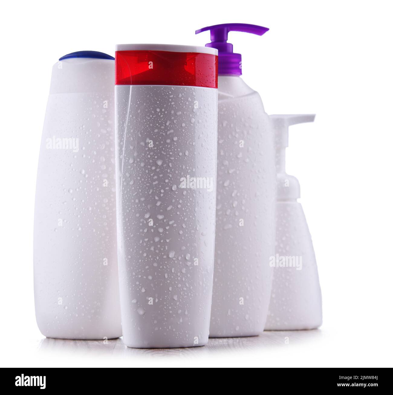 Plastic contaiers of shampoos and shower gels isolated on white ...